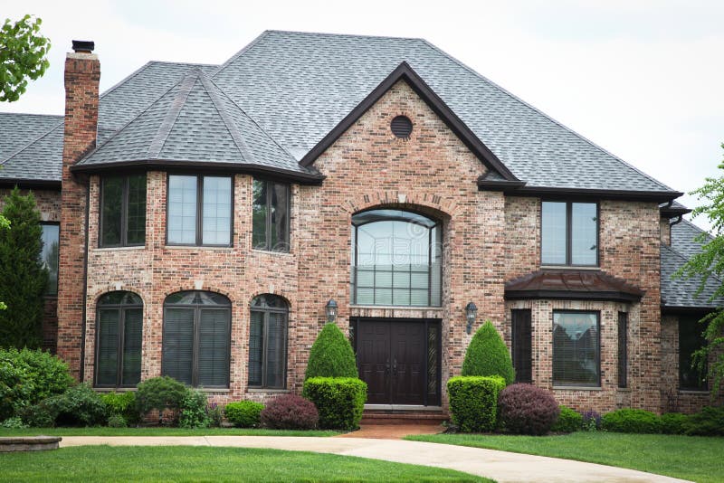 Luxury Brick House stock image. Image of brick, shrubs - 19730625