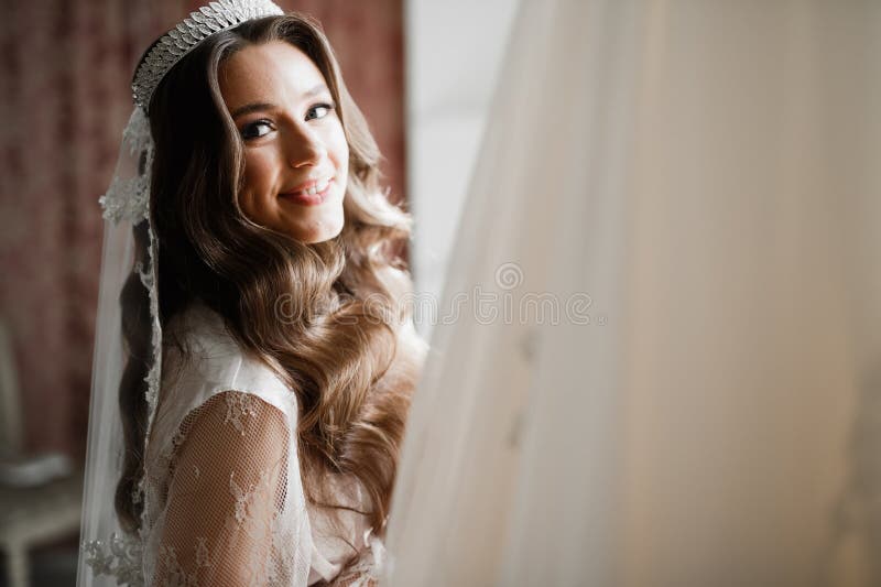 Luxury Bride in White Dress Posing while Preparing for the Wedding ...