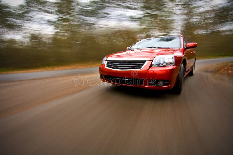 Luxury car driving fast stock photo. Image of motion - 12077792