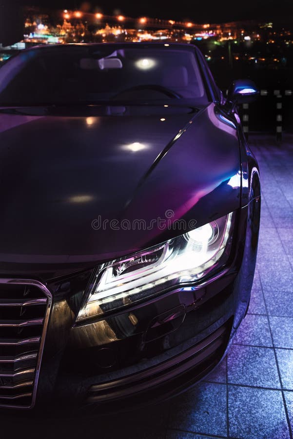 Luxury Car at the Parking in Front of the Night City Stock Image ...