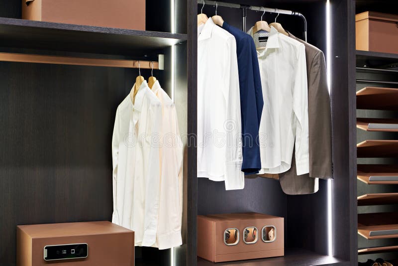Luxury closet with clothes stock photo. Image of wall - 317750260