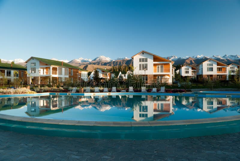 Luxury cottages stock photo. Image of chaise, pool, street - 11099182