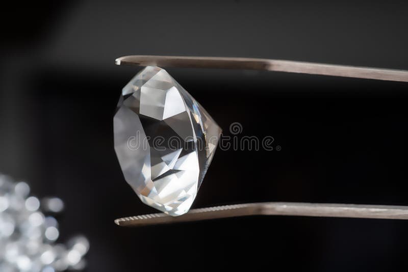 Diamond in Tweezers with Ring Stock Photo - Image of diamond, close ...