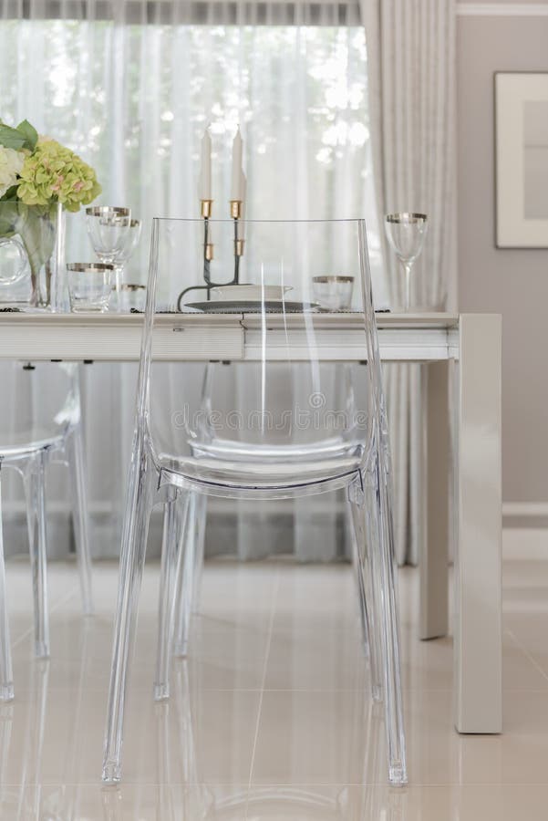 Luxury Dining Room with Translucent Chair Stock Image - Image of silver ...
