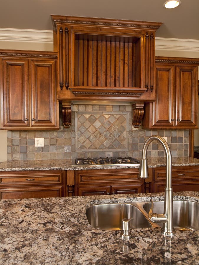 Kitchen Granite Range and Hood Design Stock Photo - Image of home, sink ...