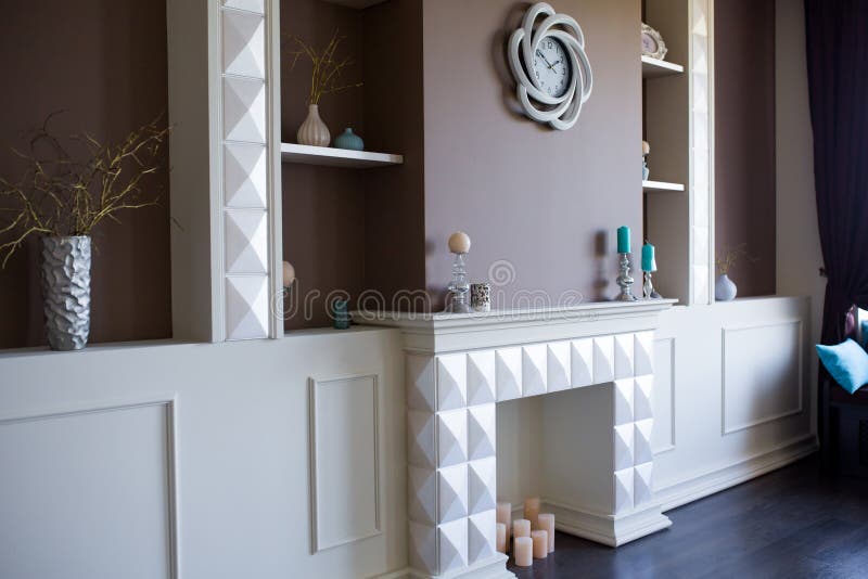 Luxury Home White Fireplace with Stone, Clock and Brown Walls. Stock ...