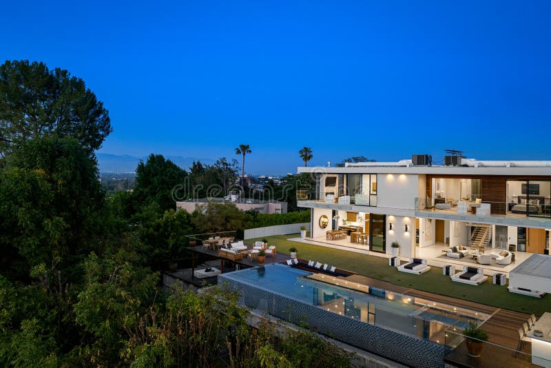 Luxury House and Pool Illuminated at Night Stock Image - Image of ...