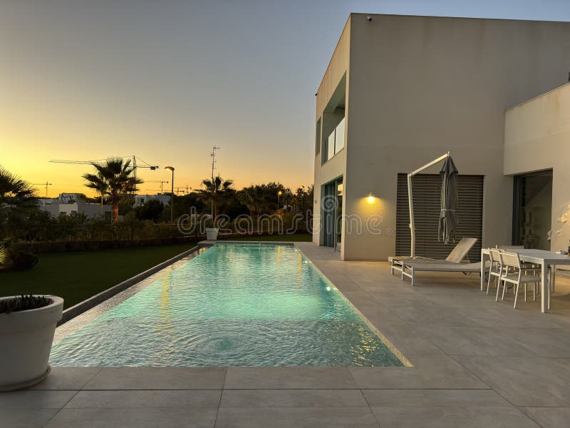 Luxury House with Swimming Pool at Sunset Concept Stock Image - Image ...