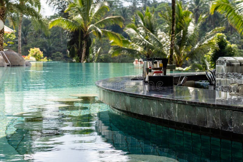 A Luxury Infinity Pool in a Tropical Resort Stock Image - Image of ...