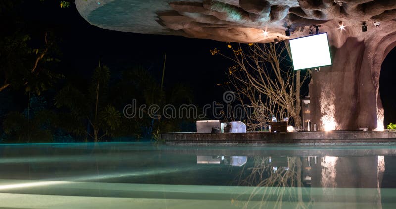 A Luxury Infinity Pool in a Tropical Resort at Night Stock Image ...