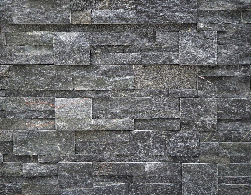 Luxury Interior Wall Cladding Made of Dark Gray Natural Stone. Stock ...
