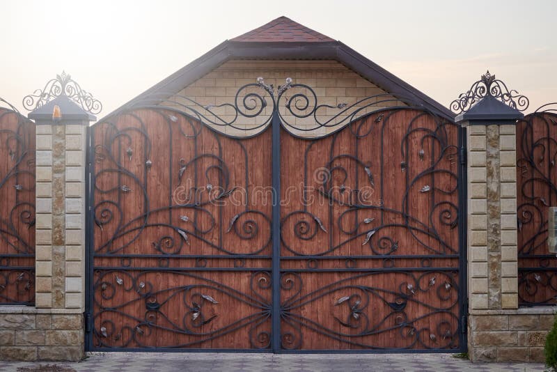 Luxury Metal Wrought Gates with Decorative Elements Stock Image - Image ...