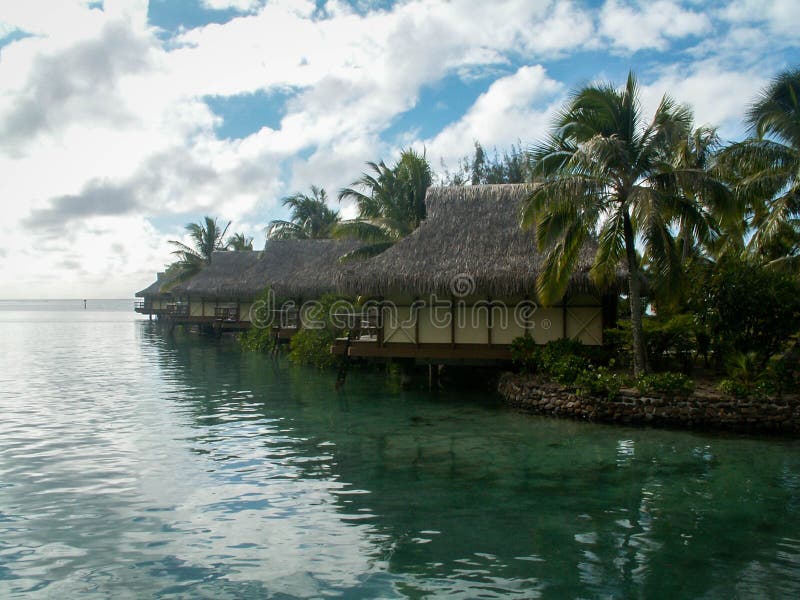 Luxury Moorea Huts stock photo. Image of clouds, beach - 48216990