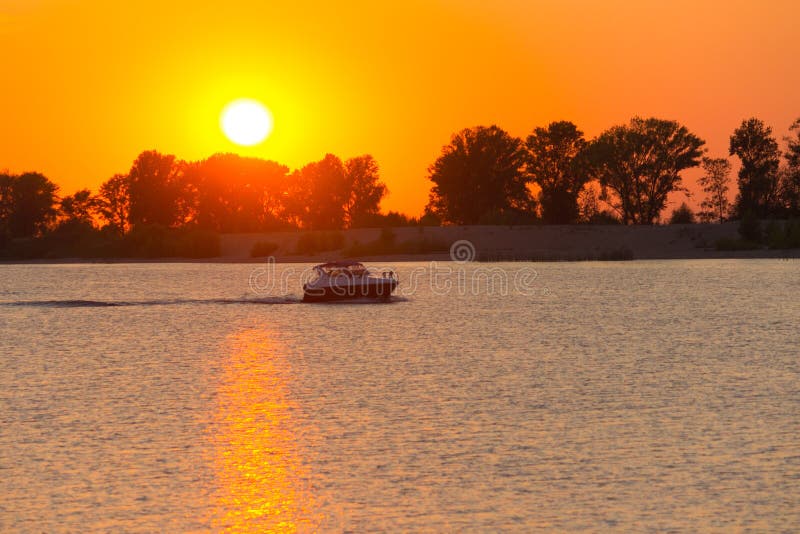Luxury Motor Boat at Sunset Stock Photo - Image of amazing, life: 133103910