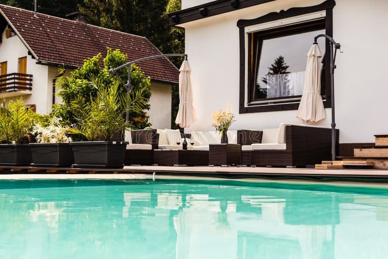 Luxury pool lounge stock image. Image of exterior, garden - 58651729
