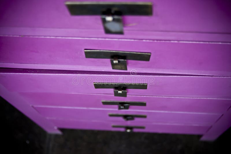 Luxury Purple Chest of Drawers with Metal Rivets. Stock Photo - Image ...