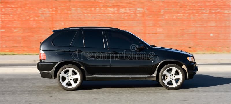 Luxury Sport Utility Vehicle Stock Photo - Image of profile, paths: 3702920