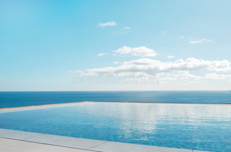 Luxury Swimming Pool in Front of the Sea. Swimming Pool with Beautiful ...