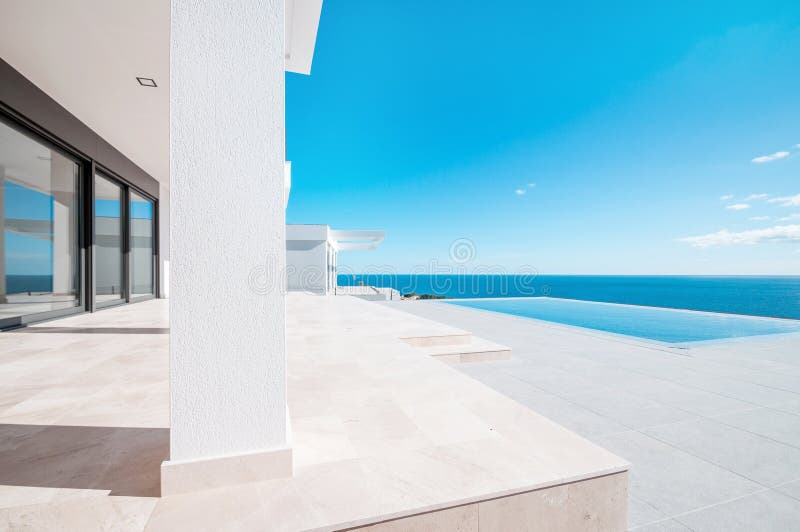 Luxury Swimming Pool in Front of the Sea. Swimming Pool with Beautiful ...