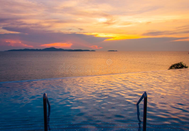 Luxury Swimming Pool in Front of Sea at during Sunset Stock Photo ...