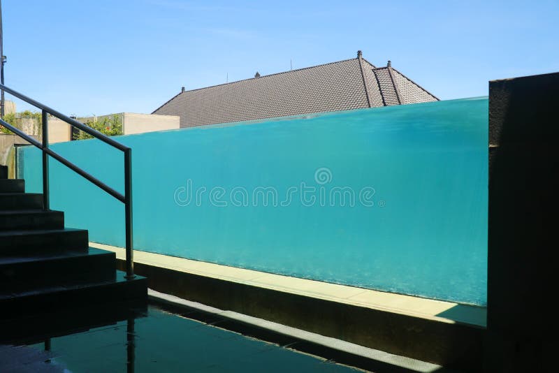 Luxury Swimming Pool with Transparent Glass Wall Stock Image - Image of ...
