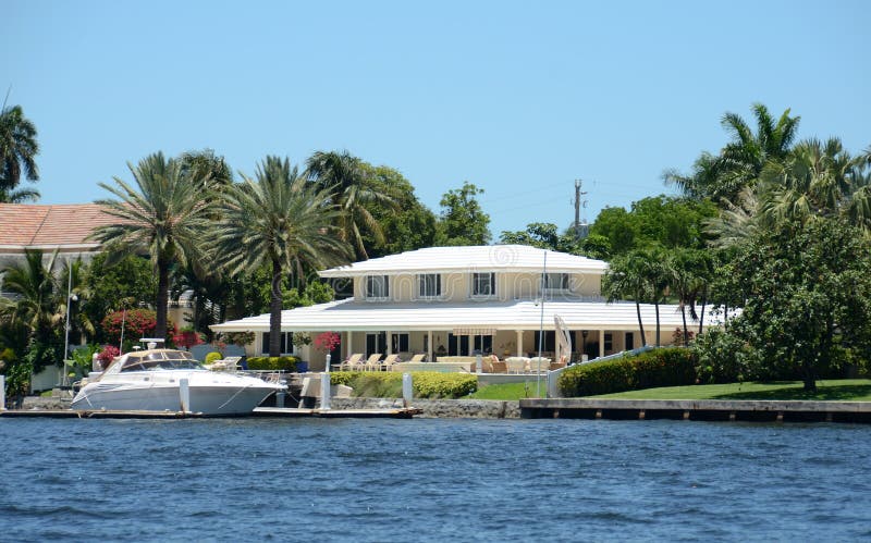 Luxury waterfront home stock image. Image of dock, property - 25598395