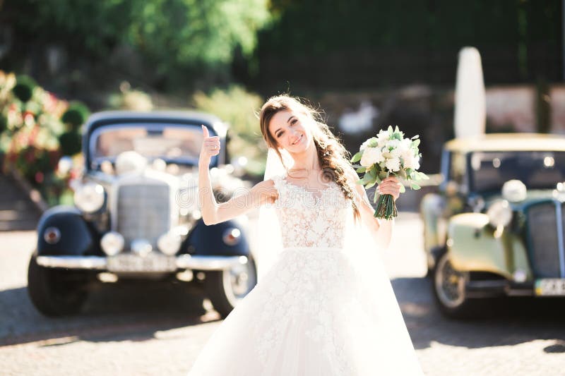 Luxury Wedding Bride, Girl Posing and Smiling with Bouquet Stock Image ...