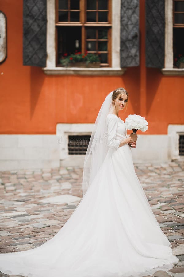 Luxury Wedding Bride, Girl Posing and Smiling with Bouquet Stock Image ...