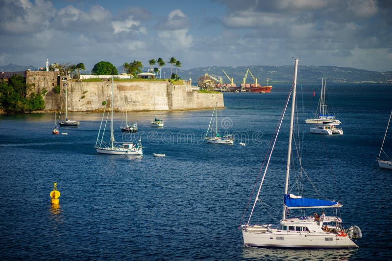 Luxury Yachts Anchored in the Blue Water with Fort on Background Stock ...