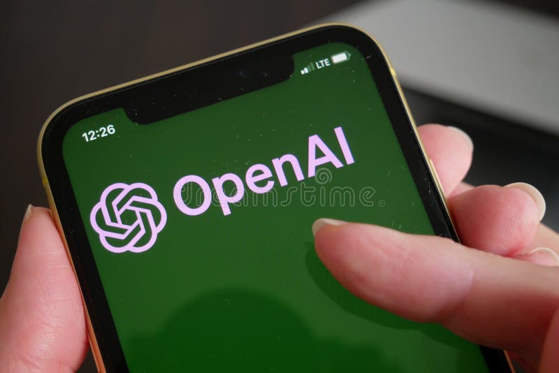 Lviv, Ukraine - 03 11 2023: Hand Holding Smartphone with OpenAI Site in ...