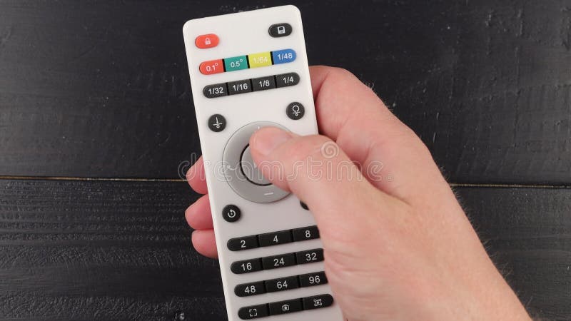 LVIV, UKRAINE - June 05, 2023: White Control Panel in Hands Stock Video ...