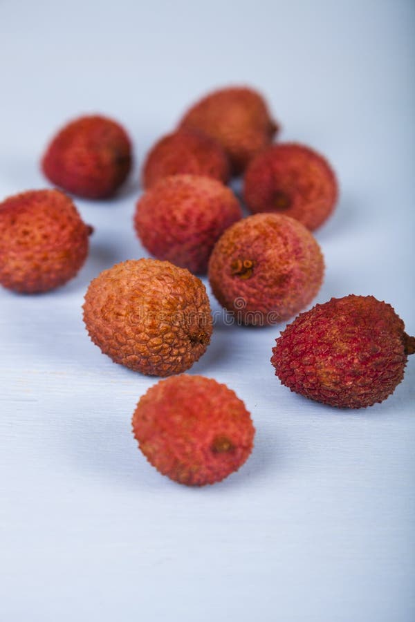 Lychee in a wooden bowl stock image. Image of chinese - 108299377