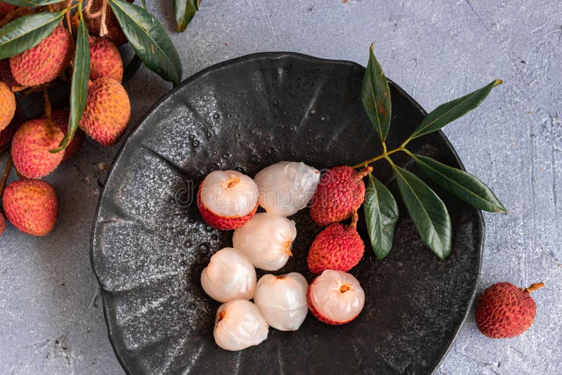 Lychee with Leaves on Gray Background. Tropical Fruit Stock Image ...