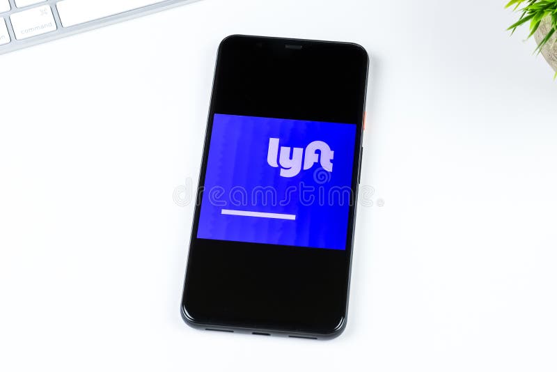 Lyft Direct, Powered by Payfare App Logo on a Smartphone Screen ...