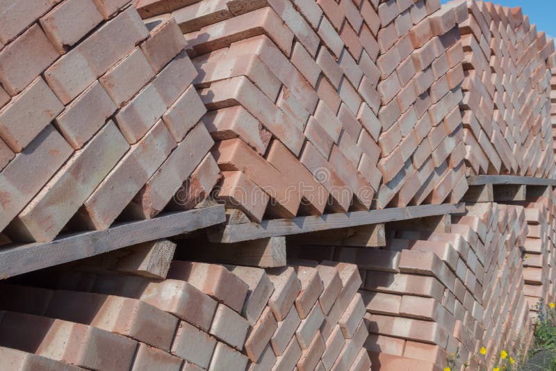 Stowed on Top of Each Other are Two Rows of Wooden Pallets, Standing ...