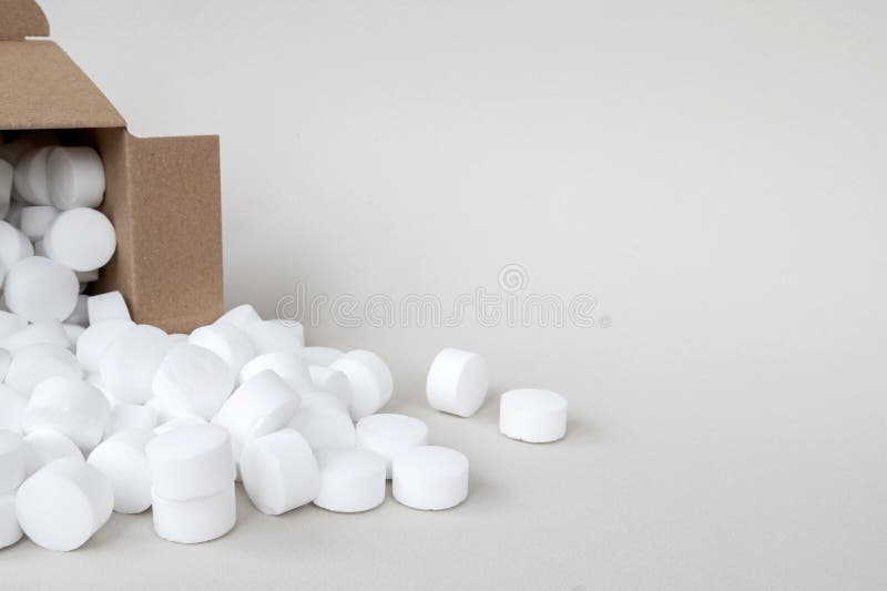 Lying Part of the Box with Scattered Pressed Dishwasher Salt, Side View ...