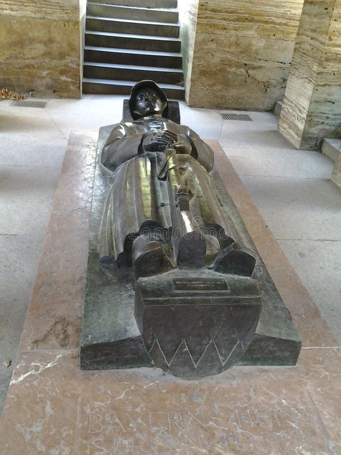 Lying Statue of a Fallen Soldier. Stock Image - Image of floor, rock ...