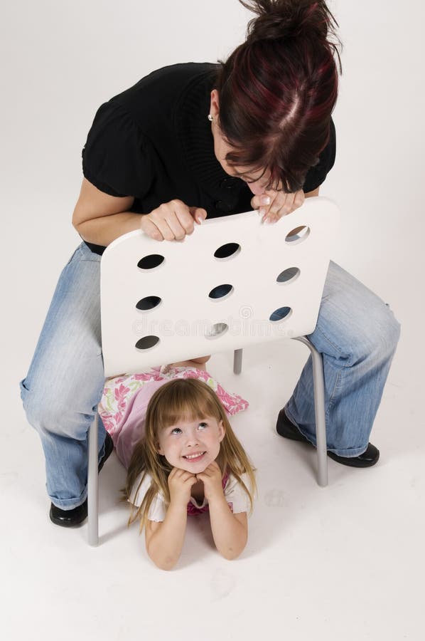 Lying under chair stock photo. Image of studio, person - 6974058
