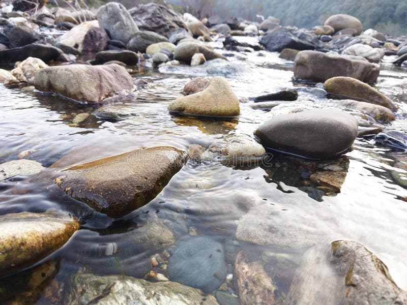 Lying Water in Valleys with Medium-sized Stones Stock Image - Image of ...