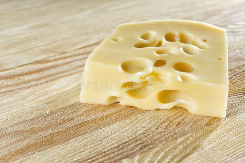 Lying on a Wooden Table Cheese Stock Image - Image of snack, slice ...
