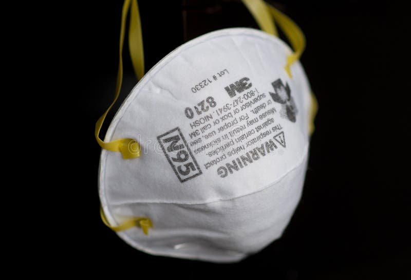 A 3M N95 mask is shown editorial photo. Image of pandemic - 210021241