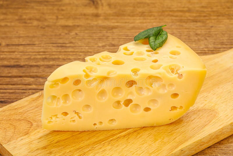 Maasdam Cheese - Yellow Triangle with Holes Stock Image - Image of ...