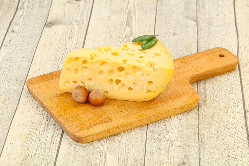Maasdam Cheese - Yellow Triangle with Holes Stock Photo - Image of ...
