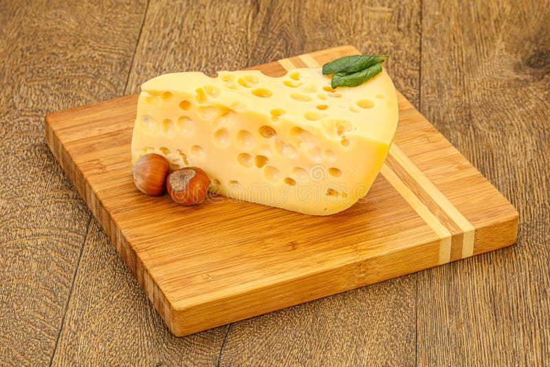 Maasdam Cheese - Yellow Triangle with Holes Stock Image - Image of ...