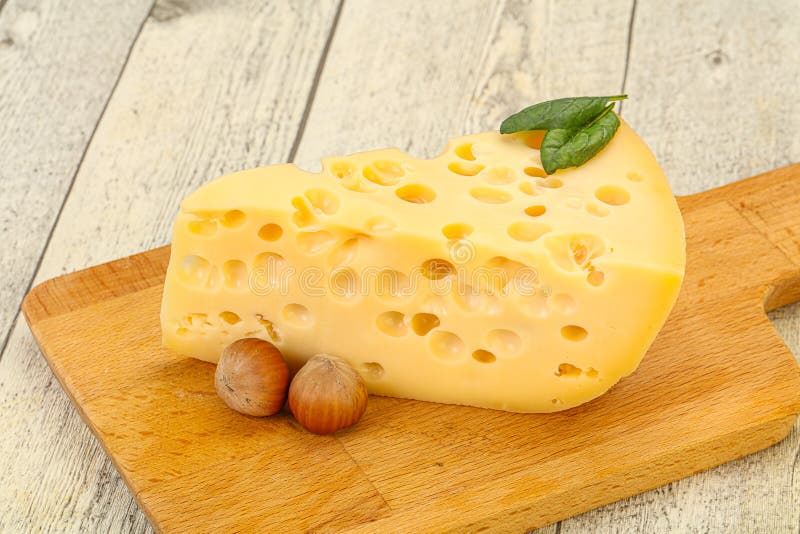 Maasdam Cheese - Yellow Triangle with Holes Stock Photo - Image of ...