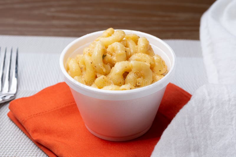 Mac n cheese cup stock photo. Image of napkin, fork - 182056516