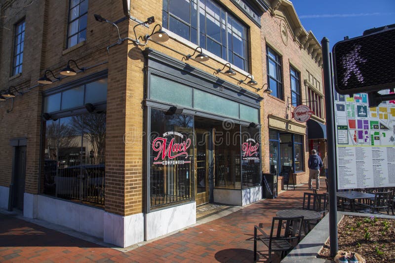 Mac’s Chophouse with a Red Brick Sidewalk Lined with Shops, Restaurants ...
