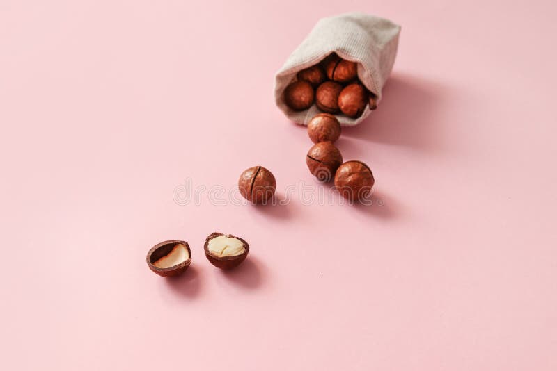 Macadamia Nuts in a Bag on a Pink Background Design for Poster, Article ...