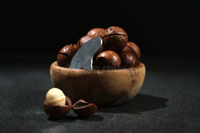 Macadamia Nuts with a Key on Turquoise Background Stock Image - Image ...