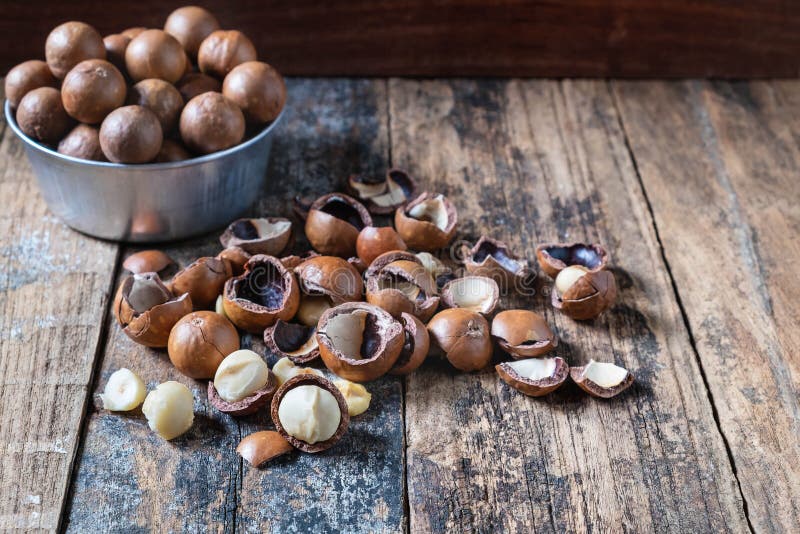 Macadamia Nuts with Shells in a Bowl Stock Photo - Image of life, fruit ...